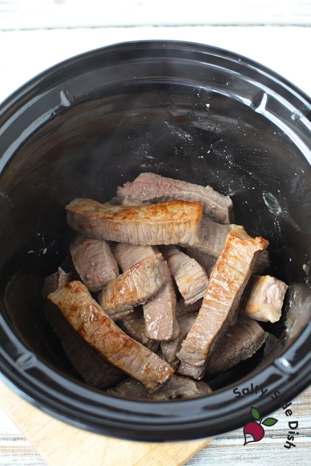 Slow Cooker Peppered Steak Recipe | Salty Side Dish
